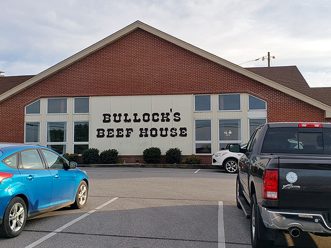 The brick facade of Bullock's Beef House stands like a carnivore's lighthouse, beckoning hungry travelers through Carroll County's rolling countryside.