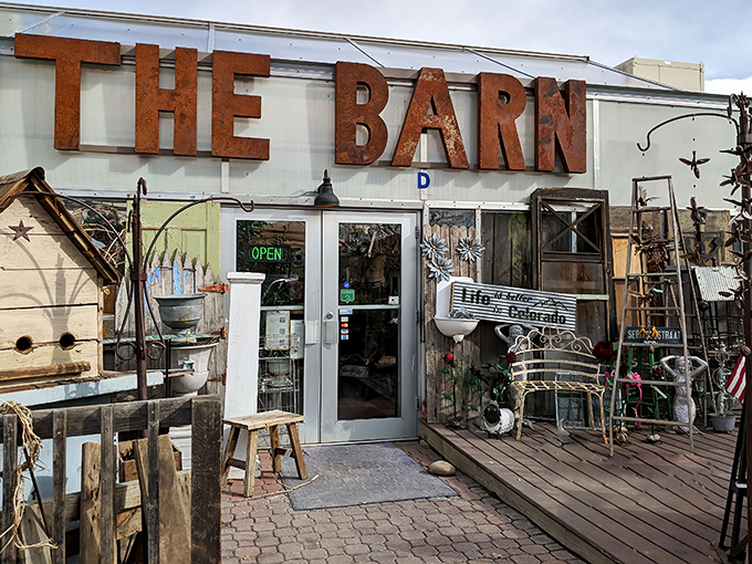 That iconic rusty sign isn't just weathered&mdash;it's a beacon calling to treasure hunters everywhere. The Barn's exterior promises adventures within.
