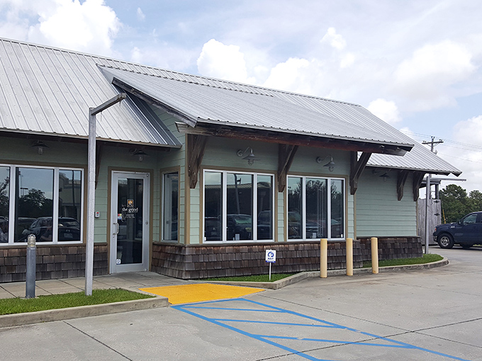 Welcome to Grind Coffee & Nosh, where rustic charm meets culinary delight. This unassuming exterior houses a treasure trove of flavors that'll make your taste buds do a happy dance.