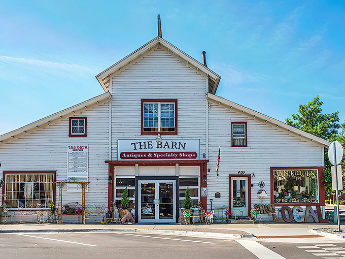 That iconic rusty sign isn't just weathered&mdash;it's a beacon calling to treasure hunters everywhere. The Barn's exterior promises adventures within.