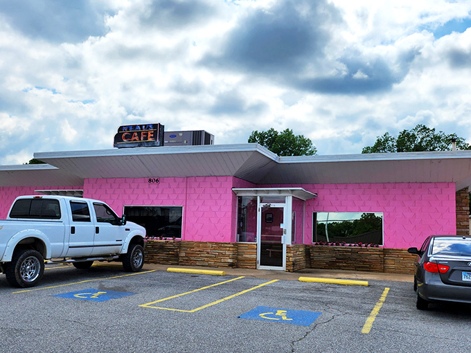 The pink palace of poultry stands proudly against the Arkansas sky, like a delicious mirage beckoning hungry travelers from miles around.