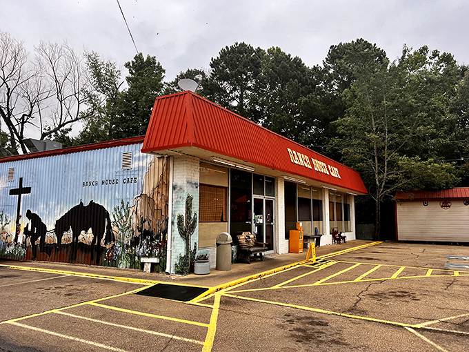 The bright red roof of Ranch House Cafe beckons hungry travelers like a culinary lighthouse on the Arkansas horizon.