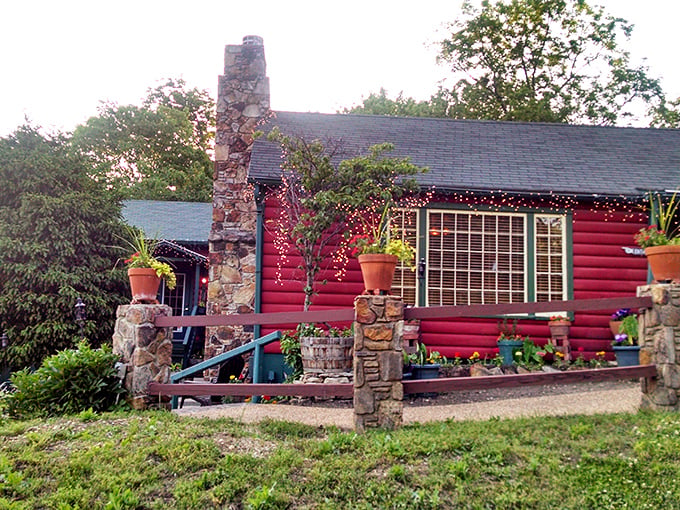 The rustic red cabin exterior isn't trying to impress anyone&mdash;until you taste what's inside. Ozark charm at its most delicious.