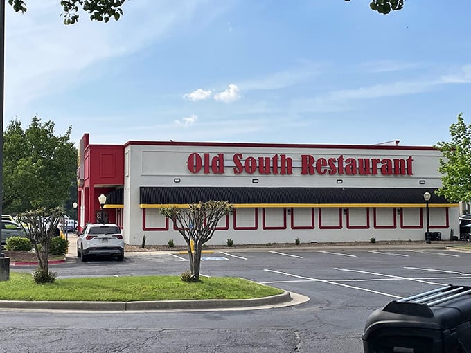 The crimson facade of Old South Restaurant stands like a beacon of comfort food in Russellville, promising Southern hospitality before you even step inside.