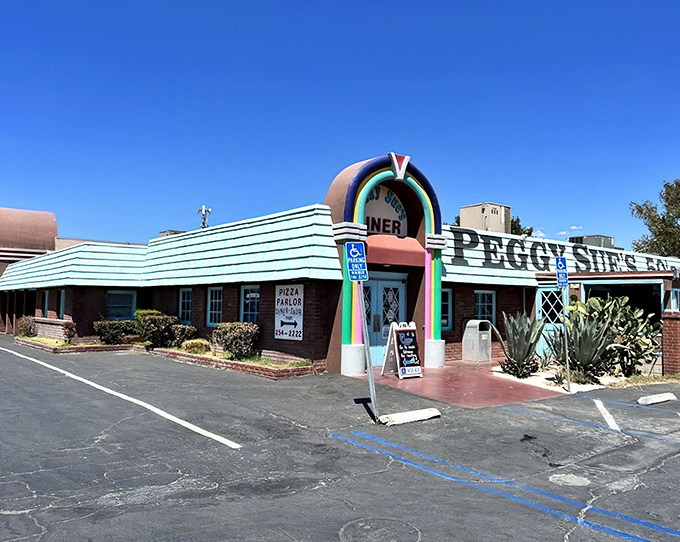 The rainbow-colored archway of Peggy Sue's beckons like a time portal in the desert. This isn't just a pit stop&mdash;it's a destination.