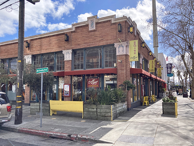 The bright orange awning and cheerful yellow chairs are like a beacon calling to barbecue pilgrims on Oakland's Broadway. Welcome to flavor town.
