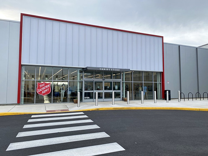 The gleaming white exterior with its bold red trim isn't just a building&mdash;it's a portal to possibility. Treasure awaits inside.