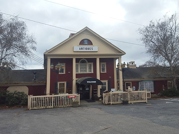 A New England time portal disguised as a charming red building with white trim. Cape Cod's architectural equivalent of "come on in, we've got stories to tell."