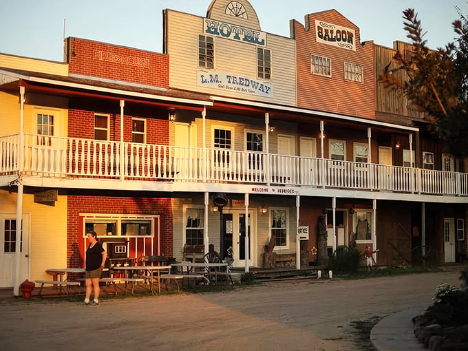 Sunset bathes Hedrick's Old West fa&ccedil;ade in golden light, where the promise of adventure awaits behind every saloon door and hotel window.