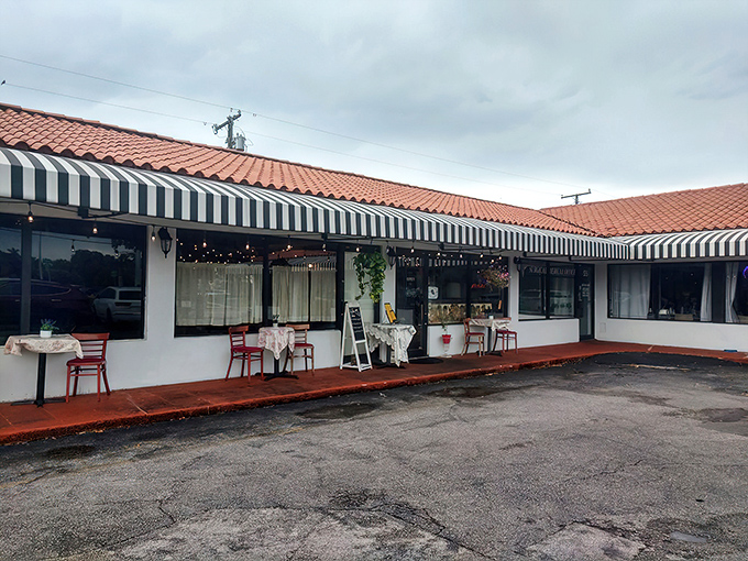 The black and white striped awning and bright red door of La Fresa Francesa isn't just charming&mdash;it's like Paris decided to vacation in Hialeah and never left.