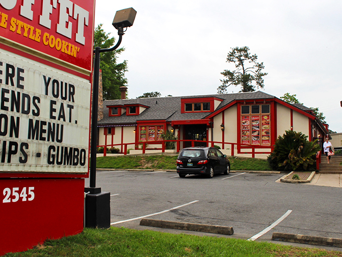 The red-trimmed exterior of Kacey's Buffet glows with promise at dusk, like a beacon calling hungry travelers to a homestyle feast.