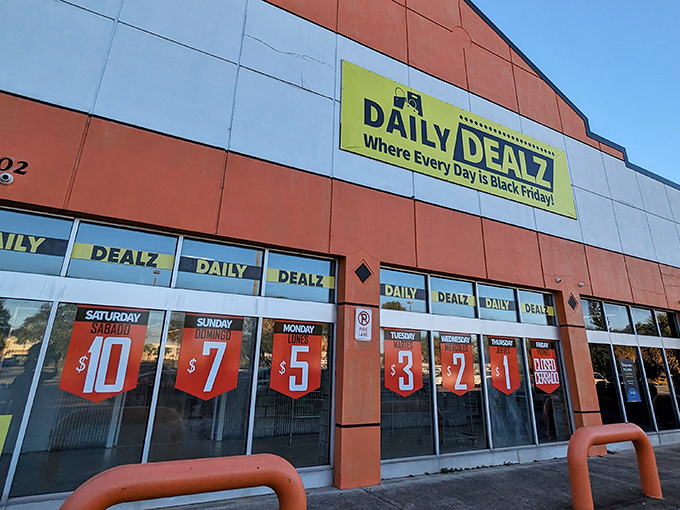 The bright orange facade of Daily Dealz stands out like a bargain beacon, complete with its promise that "Every Day is Black Friday!" No false advertising here.