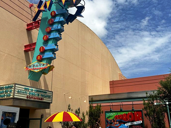 The retro marquee beckons like a neon time machine, promising all the atomic-age charm your nostalgia-loving heart desires.