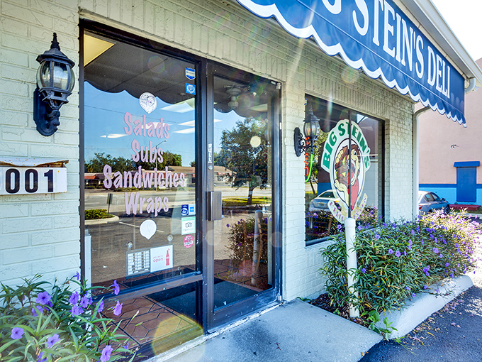 Welcome to sandwich paradise! Big Stein's Deli's cheery blue awning beckons like a siren song to hungry passersby. Resistance is futile, my friends.