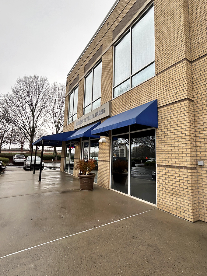 The unassuming storefront with its bright blue awnings might fool you, but inside Grouchy's lies a Manhattan experience that miraculously landed in Alpharetta.