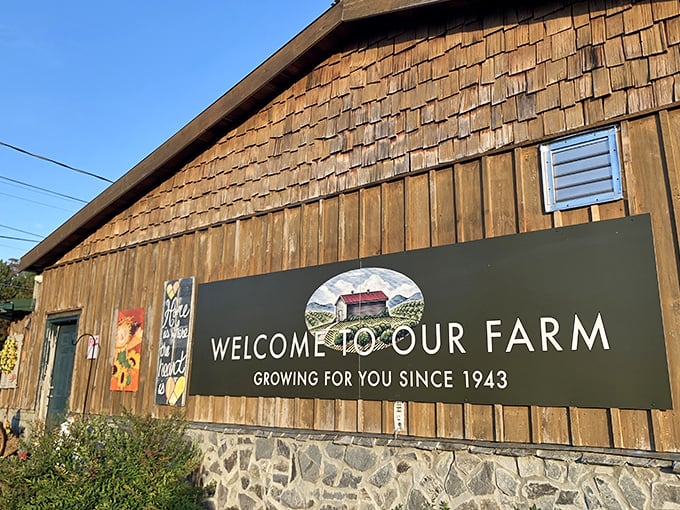 Welcome to paradise! The rustic wooden exterior of Mercier Orchards invites visitors with its "Welcome to Our Farm" sign and promise of U-pick adventures.