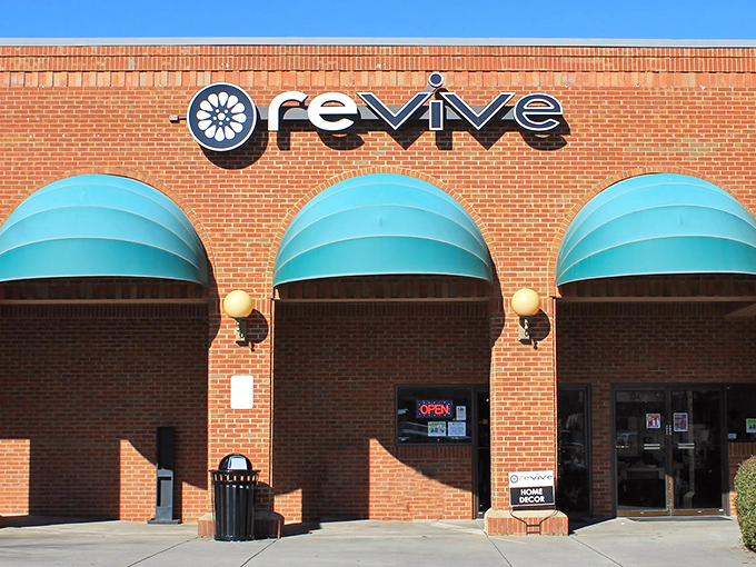 The brick facade with those distinctive teal awnings isn't just eye-catching&mdash;it's the gateway to a treasure hunter's paradise hidden in plain sight in Woodstock.