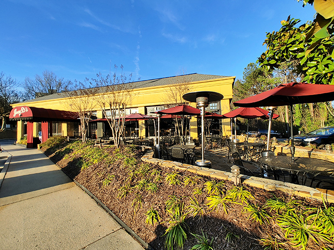 The iconic burgundy awning of Joey D's beckons like a culinary lighthouse in Dunwoody, promising comfort and indulgence just steps from the parking lot.