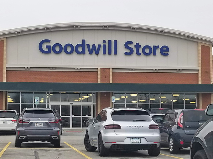 The Fishers Goodwill welcomes bargain hunters with its distinctive curved roofline and bold blue signage&mdash;a cathedral of second-hand treasures awaiting discovery. 