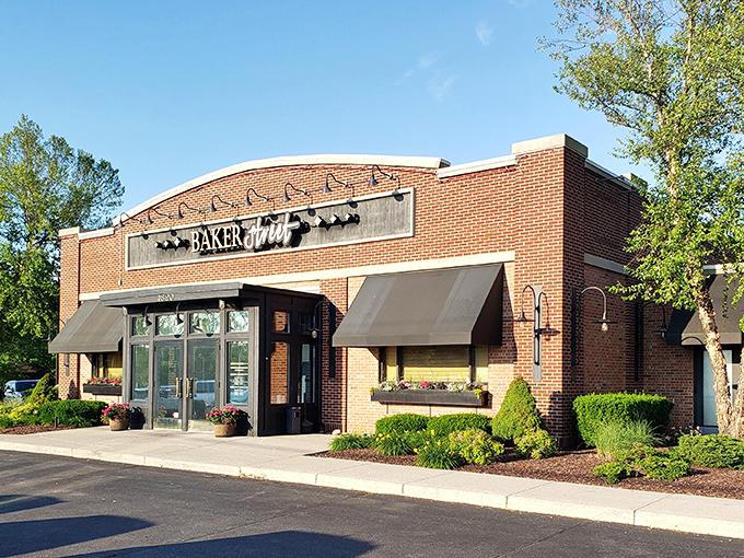 The brick exterior of BakerStreet Steakhouse stands like a confident understatement&mdash;promising excellence without shouting about it. Those flower boxes aren't just pretty; they're a preview of the attention to detail waiting inside.