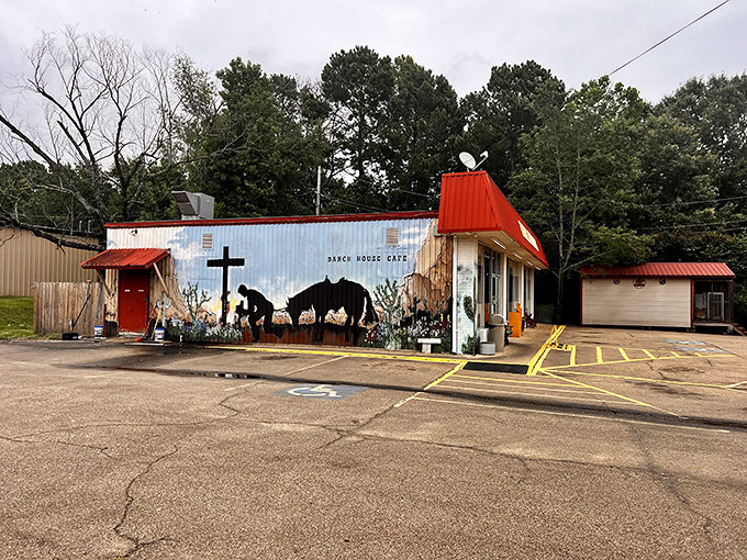 The bright red roof of Ranch House Cafe beckons hungry travelers like a culinary lighthouse on the Arkansas horizon.