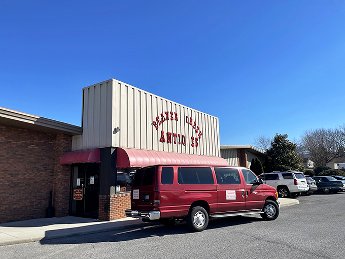 The unassuming exterior of Beaver Creek Antique Market proves that judging books by covers is a rookie mistake. Treasures await behind that bold red signage.
