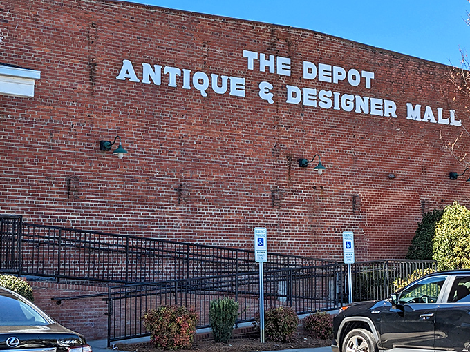 The imposing brick facade and clock tower of Gibson Mill stands as a sentinel of history, transformed from textile production to treasure hunting headquarters.