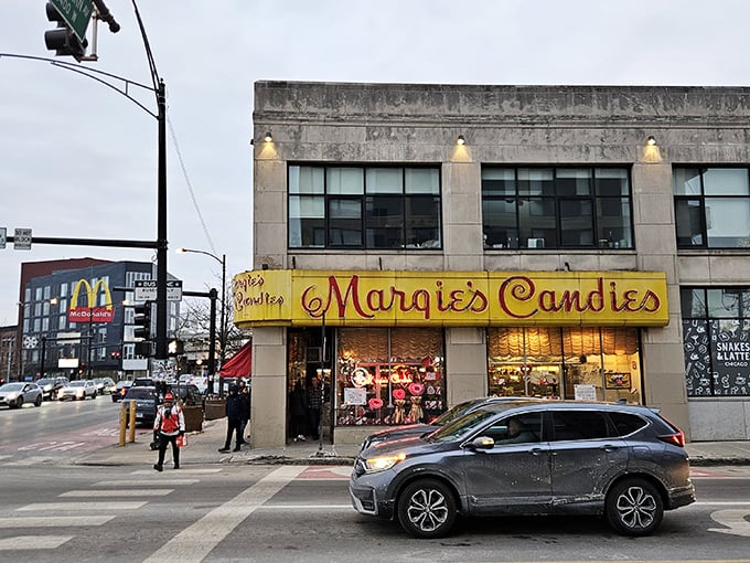 That iconic yellow and red sign beckons like a lighthouse for sweet-toothed sailors navigating the urban seas of Chicago's neighborhoods.