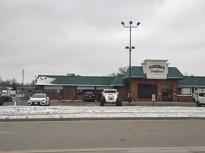 The classic brick-and-green exterior of Niemerg's stands like a culinary lighthouse for hungry travelers. Interstate driving never had such a delicious destination waiting at the end.