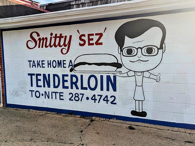 The bright red awning of Smitty's proudly announces "The Original King Tenderloin Since 1952"&mdash;a culinary landmark that's been perfecting pork longer than most of us have been eating it.