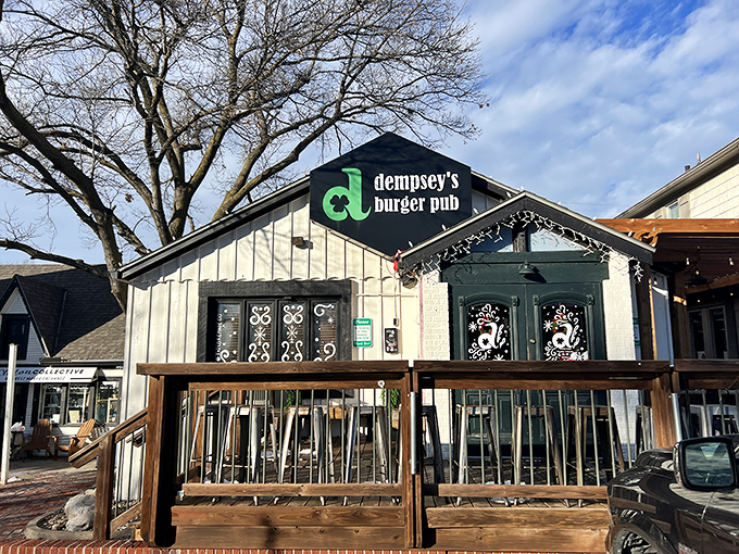 Dempsey's white cottage-like exterior stands proudly in Wichita, its distinctive green logo beckoning burger enthusiasts like a meaty lighthouse on a hungry sea.