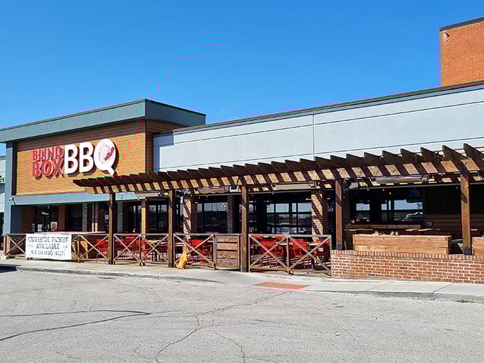 The bright orange facade of Blind Box BBQ stands out like a beacon for hungry barbecue pilgrims. No smoke signals needed&mdash;you can smell the goodness from the parking lot.