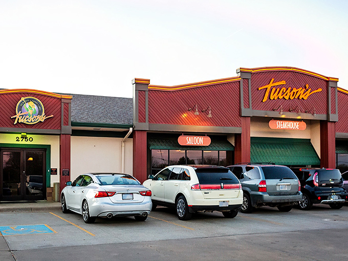 The unmistakable red exterior of Tucson's beckons like a beacon for beef lovers. Western charm meets Midwest hospitality at this Salina staple.