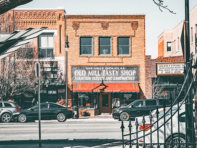 The yellow-brick storefront with its vintage red awning isn't just preserving history&mdash;it's practically a time portal to 1932 Wichita with better sandwiches.