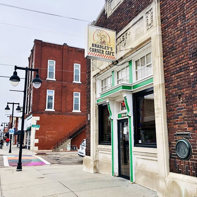 The historic brick building housing Bradley's Corner Cafe stands proudly in North Topeka, its green-trimmed entrance beckoning hungry patrons like a culinary lighthouse.