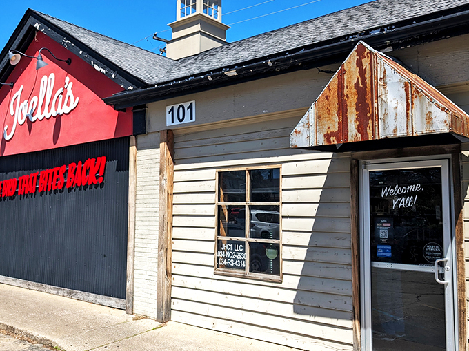 The Bird That Bites Back! isn't just a catchy slogan&mdash;it's a fiery promise painted across Joella's distinctive red facade that beckons heat-seekers from miles around.