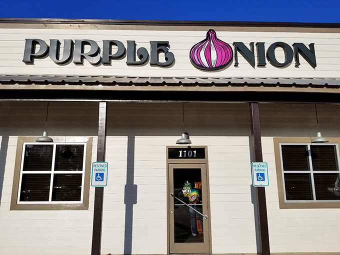 The Purple Onion's exterior beckons with its playful signage &ndash; that giant purple bulb is basically saying, "Good food happens here, folks!"