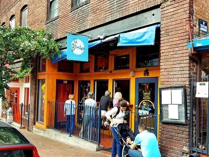 Bouchon's cheerful blue awning and warm wooden fa&ccedil;ade beckon like a Parisian whisper on Asheville's eclectic Lexington Avenue. 