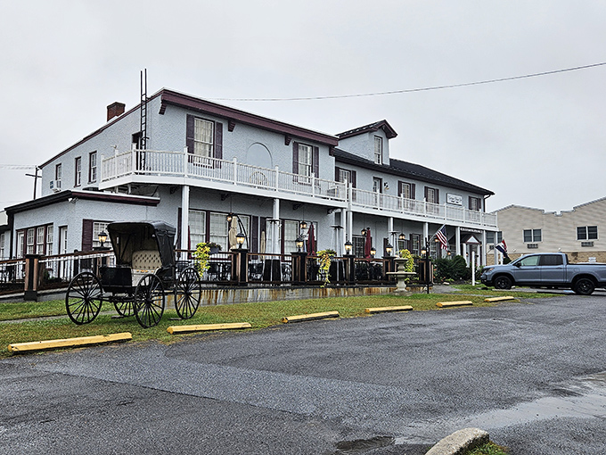 Colonial charm meets Maryland hospitality at the Carriage House Inn's pristine exterior, where that American flag isn't just decoration&mdash;it's a promise of classic American cuisine inside.