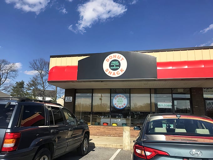 The unassuming storefront that houses donut greatness. Like finding a Michelin star restaurant in a strip mall, Donut Shack's exterior promises simple pleasures done extraordinarily well.