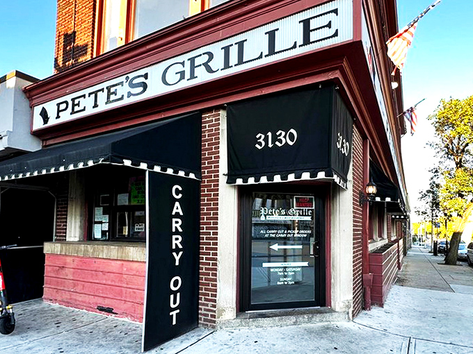The unassuming brick facade of Pete's Grille stands like a breakfast beacon on Greenmount Avenue, promising honest food without the frills.