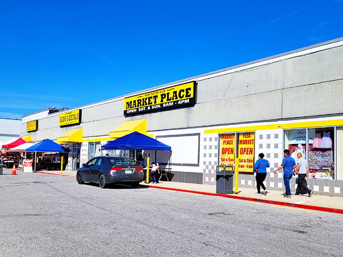 The indoor treasure hunt begins! Crowds navigate this labyrinth of bargains where one person's castoffs become another's prized possessions.