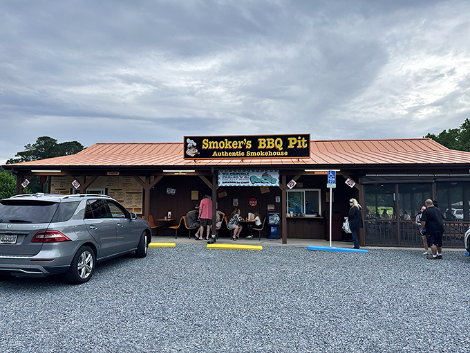 The humble wooden exterior of Smoker's BBQ Pit belies the flavor explosion waiting inside. Beach vacations need this kind of unpretentious barbecue sanctuary.