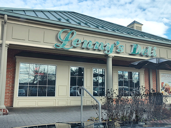 The teal script of Lenny's Deli against brick and cream siding isn't just signage&mdash;it's a promise of comfort food that transcends trends and satisfies souls.