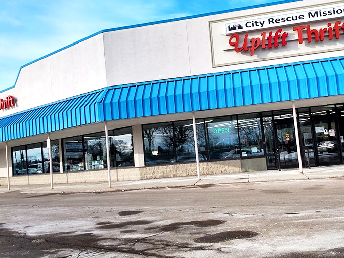That iconic blue awning signals treasure-hunting territory ahead. Like a retail oasis in Lansing's shopping landscape.