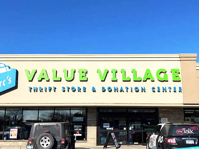 The beige facade with bright blue and green signage isn't just a storefront—it's the gateway to Minnesota's most ambitious treasure hunt.