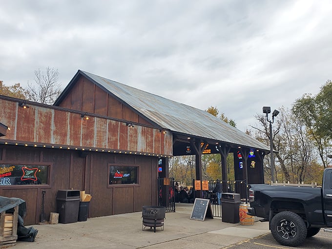 The weathered corrugated metal exterior of Big Bore Barbecue stands as a rustic beacon for meat lovers&mdash;industrial chic meets smokehouse authenticity.