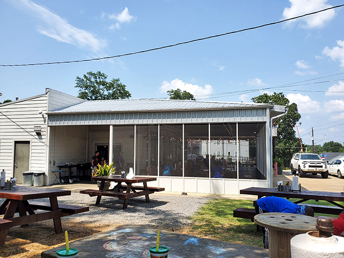 The Pig & Pint's inviting exterior glows at dusk, beckoning hungry travelers like a barbecue lighthouse in Jackson's hip Fondren district.