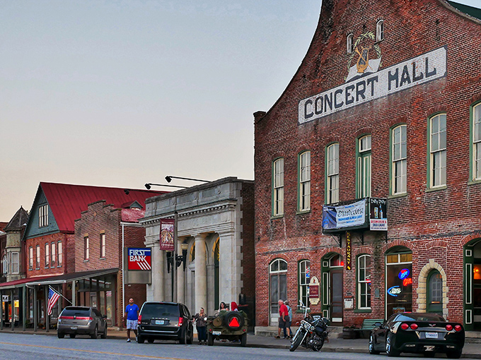 Historic brick buildings line Hermann's main street, where German heritage meets Midwest charm in a postcard-perfect small town setting.