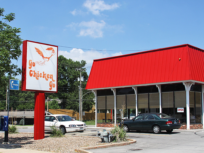 That iconic red building isn't trying to blend in. Go Chicken Go announces itself with all the subtlety of a rooster at dawn, and that's exactly why we love it.